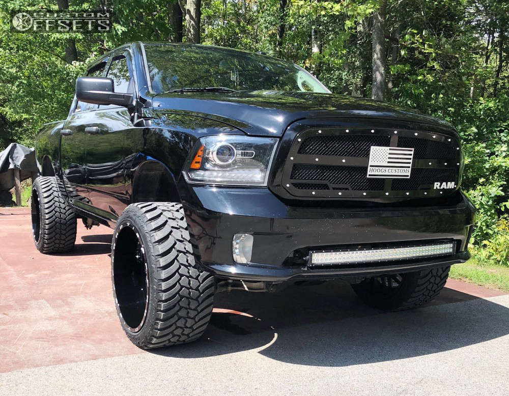 2014 Ram 1500 with 24x14 -76 TIS 544BM and 35/13.5R24 AMP Mud Terrain ...