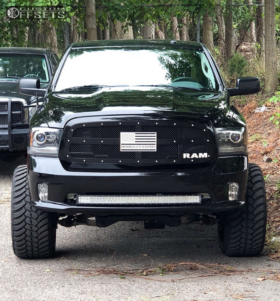 2014 Ram 1500 with 24x14 -76 TIS 544BM and 35/13.5R24 AMP Mud Terrain ...