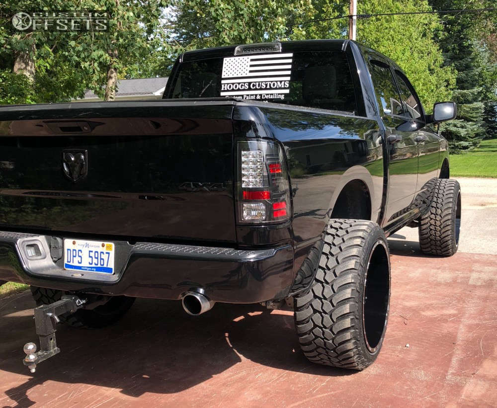 2014 Ram 1500 with 24x14 -76 TIS 544BM and 35/13.5R24 AMP Mud Terrain ...