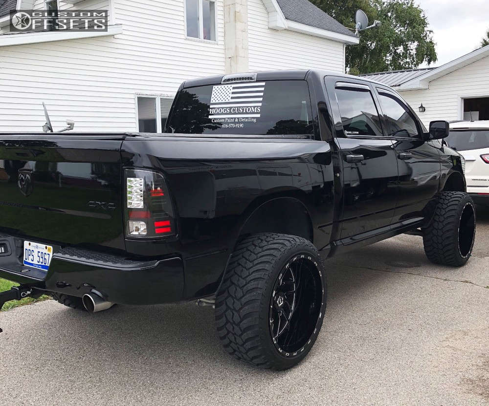 2014 Ram 1500 with 24x14 -76 TIS 544BM and 35/13.5R24 AMP Mud Terrain ...