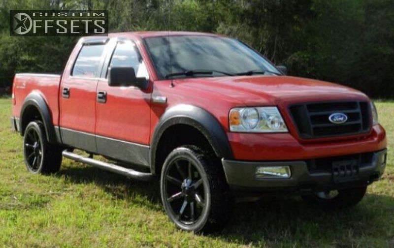 2005 Ford F-150 with 22x9.5 15 KMC Slide and 305/40R22 Nexen Roadian ...