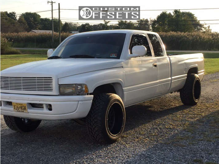 1999 Dodge Ram 1500 with 20x12 -51 Vision Rocker and 305/50R20 Nitto ...