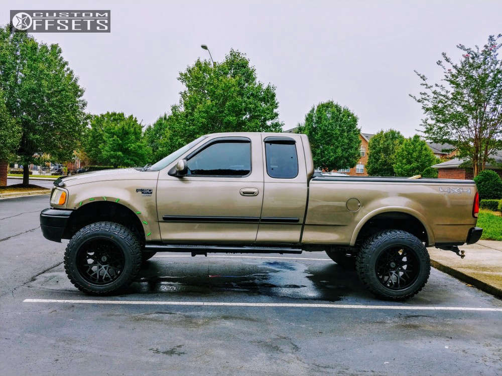 2002 Ford F-150 with 20x12 -51 Toxic Punisher and 35/12.5R20 Kanati Mud ...