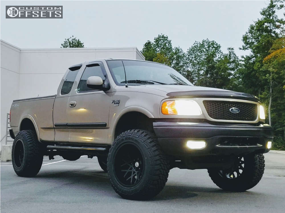 2002 Ford F-150 with 20x12 -51 Toxic Punisher and 35/12.5R20 Kanati Mud ...