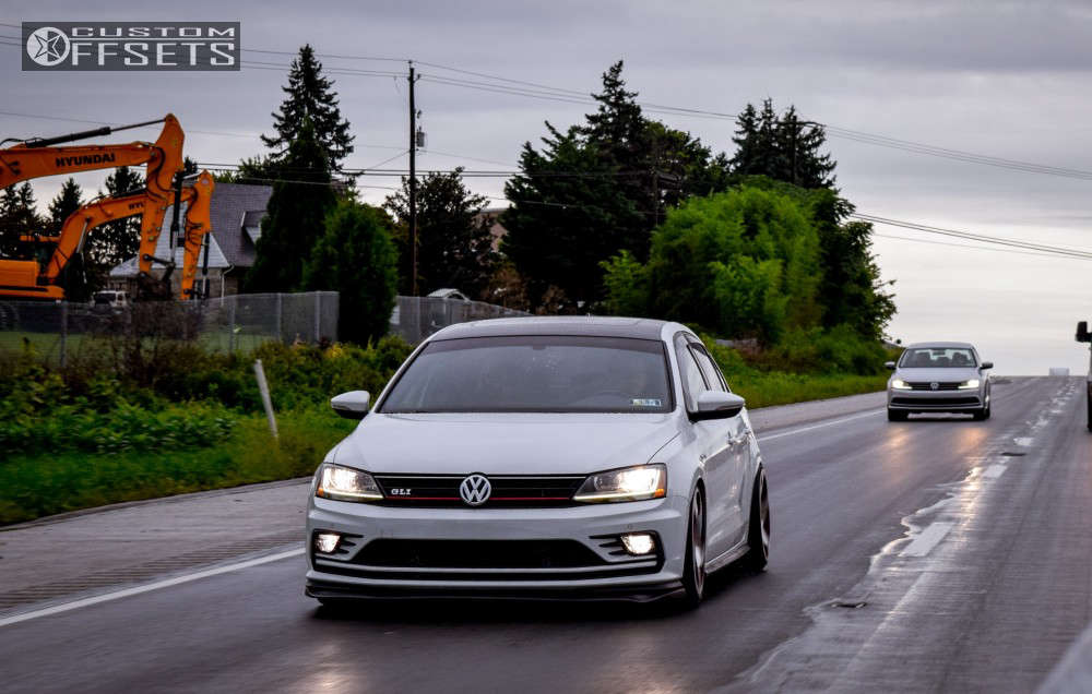 2017 Volkswagen Jetta with 18x8.5 35 WatercooledIND Cc10 and 215/35R18 ...