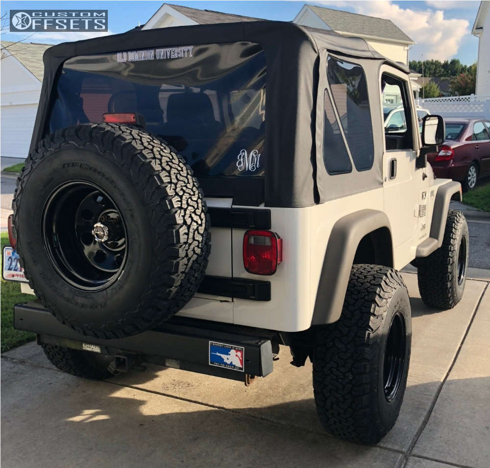 2006 Jeep Wrangler with 15x10 -39 Vision Soft 8 and 33/10.5R15 ...