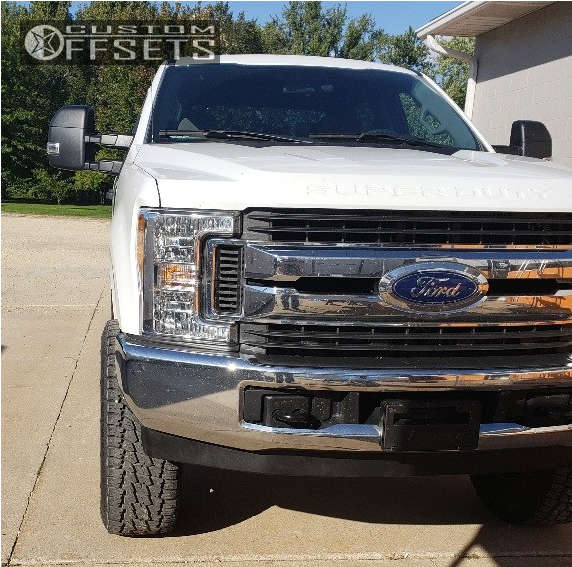 2017 Ford F-250 Super Duty with 20x9 18 Helo He900 and 37/12.5R20 Nitto ...