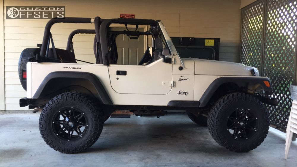 1997 Jeep Wrangler with 17x9 -12 Mayhem Rampage and 295/70R17 Nitto ...