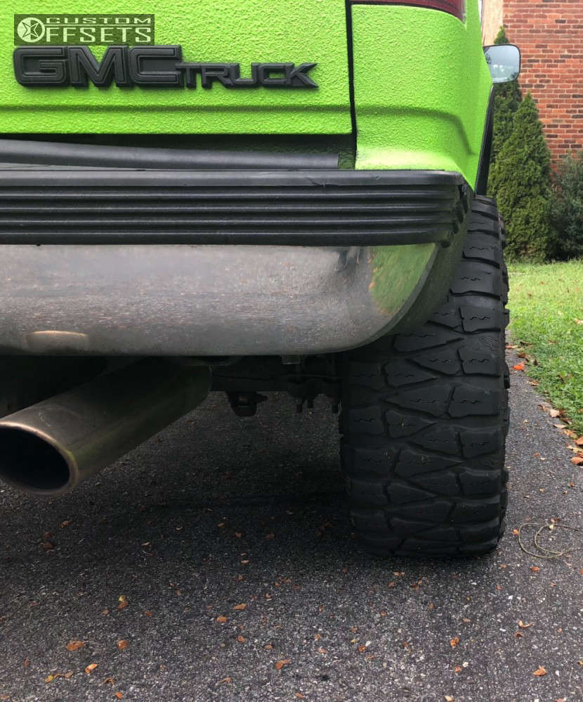 1997 GMC Yukon with 18x9 0 XD Xd122 and 33/12.5R18 Nitto Mud Grappler ...