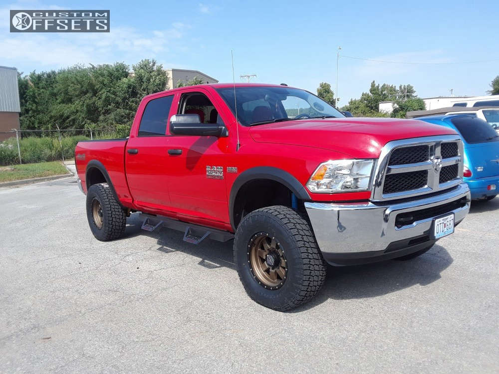 2018 Ram 2500 with 18x9 -12 Raceline Defender and 325/65R18 Nitto Terra ...