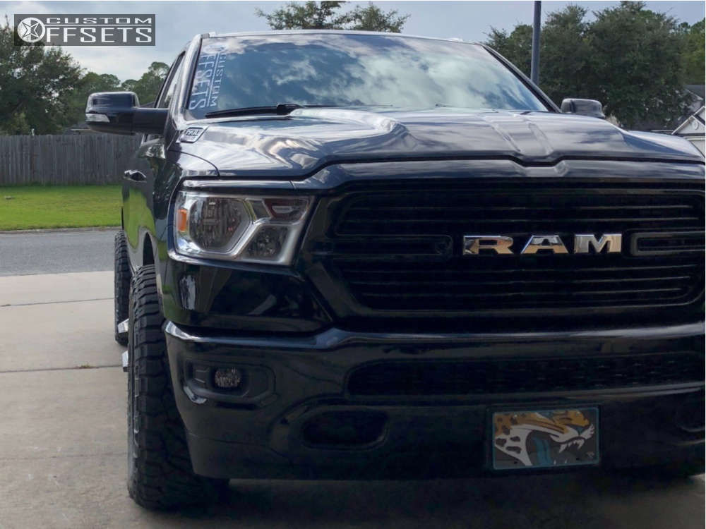 2019 Ram 1500 with 20x10 -18 Moto Metal Mo988 and 305/55R20 Nitto Ridge ...