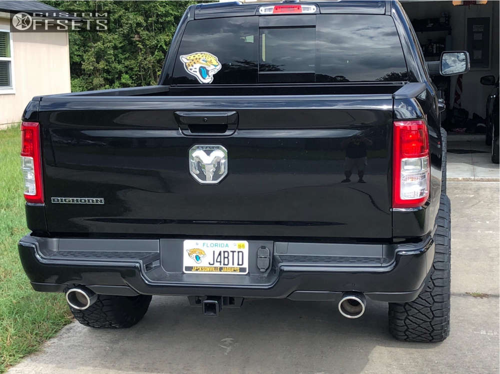 2019 Ram 1500 with 20x10 -18 Moto Metal Mo988 and 305/55R20 Nitto Ridge ...