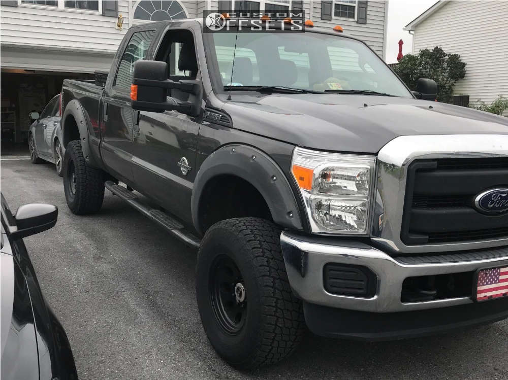 2016 Ford F-250 Super Duty with 17x9 -12 American Racing Baja and 35/12.5R17 Nitto Terra ...