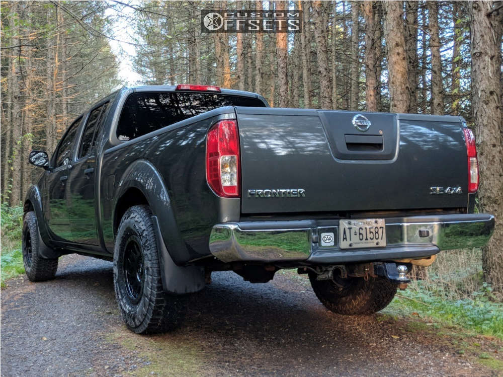 2009 Nissan Frontier with 16x8 15 Fuel Vector and 285/75R16 Falken ...