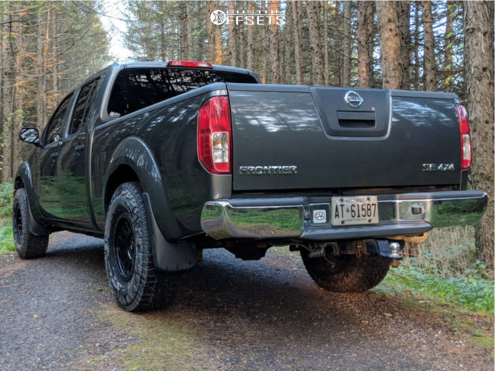 2009 Nissan Frontier with 16x8 15 Fuel Vector and 285/75R16 Falken ...