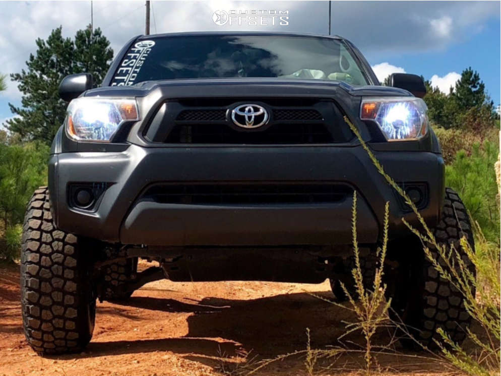 2013 Toyota Tacoma with 16x10 -38 Pro Comp 52 and 285/75R16 Ironman All ...