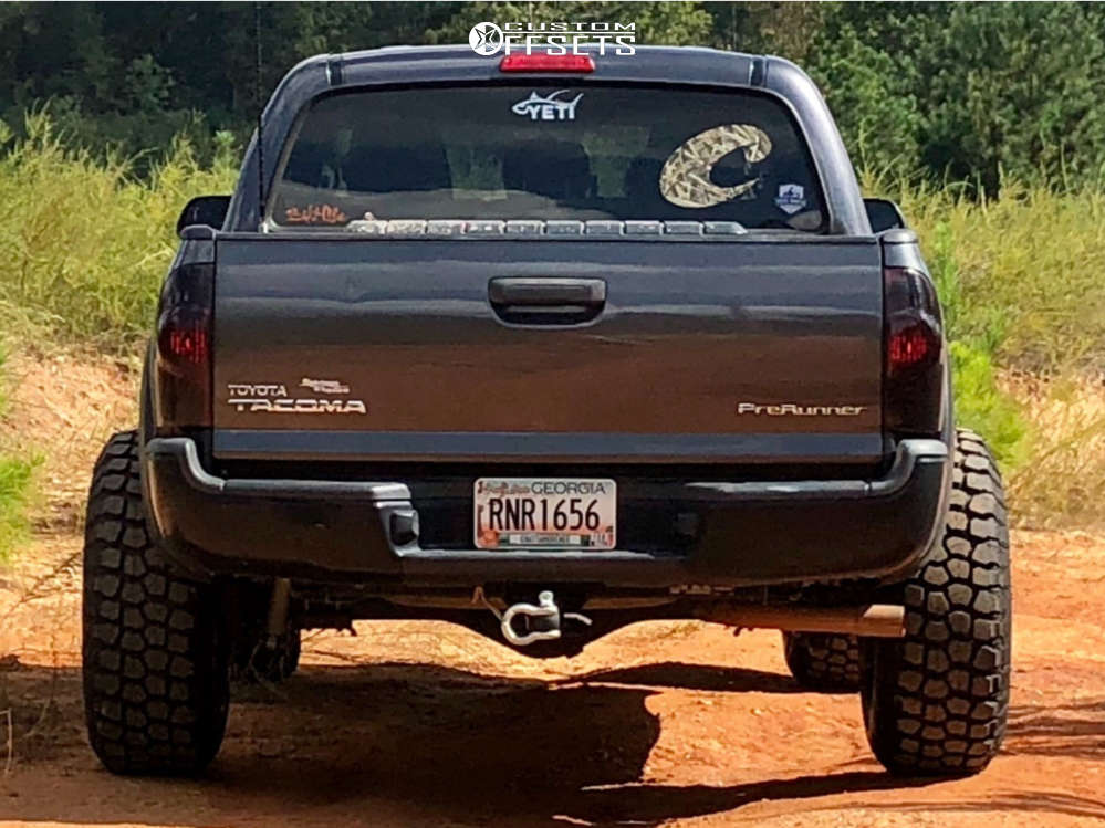 2013 Toyota Tacoma with 16x10 -38 Pro Comp 52 and 285/75R16 Ironman All ...