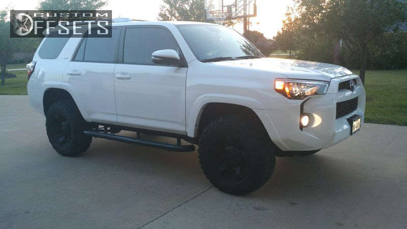 2014 Toyota 4Runner with 17x9 -12 KMC Rockstar II and 265/70R17 Federal ...