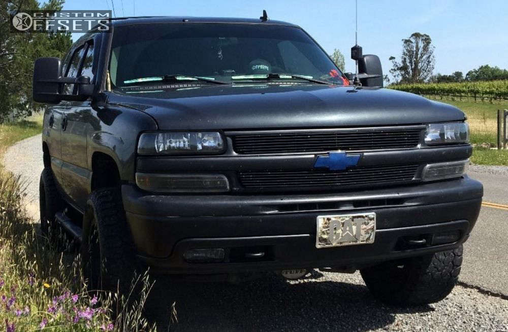 2006 Chevrolet Tahoe with 17x9 -6 Pro Comp Series 36 and 305/65R17 Pro ...