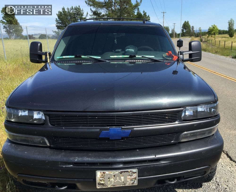 2006 Chevrolet Tahoe with 17x9 -6 Pro Comp Series 36 and 305/65R17 Pro ...