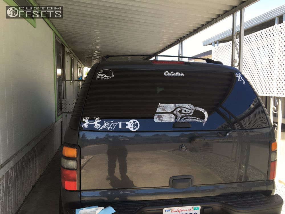 2006 Chevrolet Tahoe with 17x9 -6 Pro Comp Series 36 and 305/65R17 Pro ...