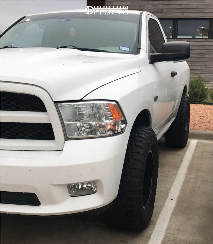2012 Ram 1500 with 18x10 -24 Tuff T15 and 35/12.5R18 Nitto Ridge ...