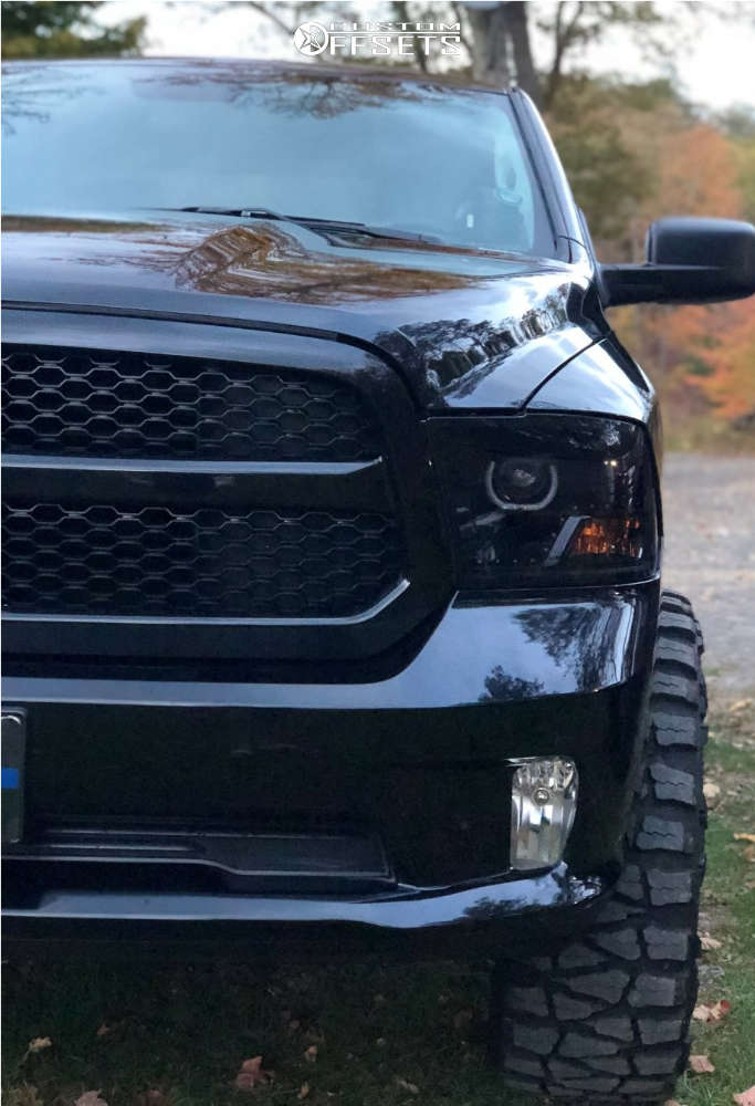 2017 Ram 1500 with 20x10 -24 Anthem Off-Road Defender and 35/12.5R20 ...