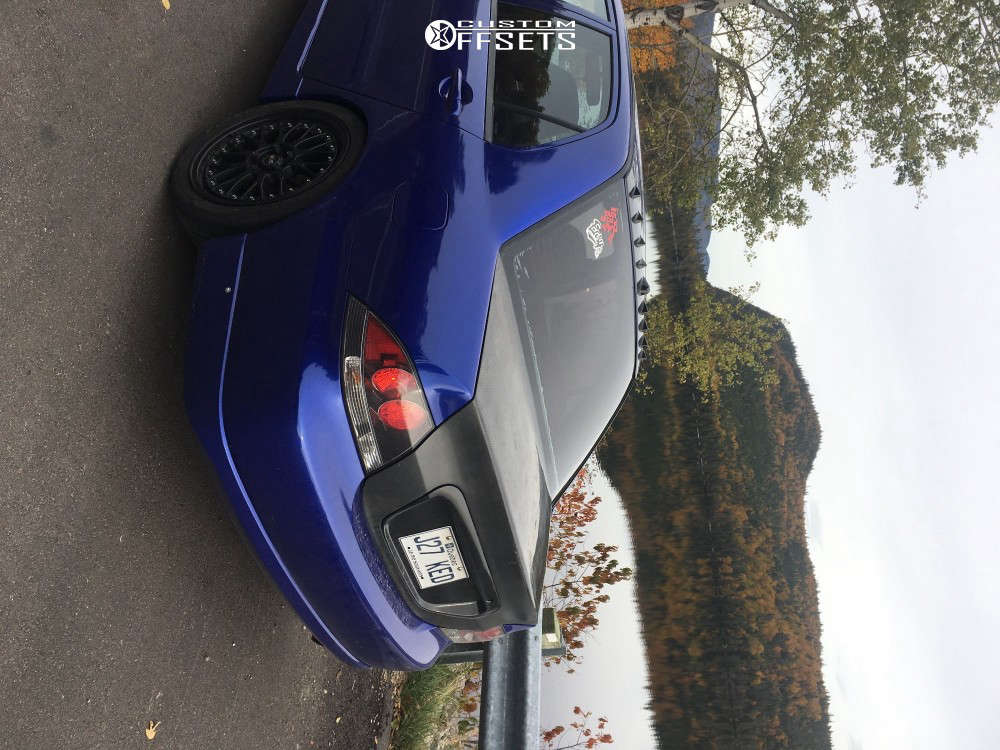 2005 Mitsubishi Lancer with 17x7 38 XXR 521 and 215/45R17 Firestone ...