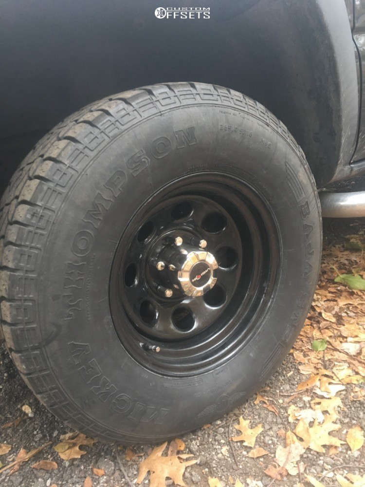2004 Chevrolet Silverado 1500 with 16x8 -12 Vision Soft 8 and 265/75R16 ...