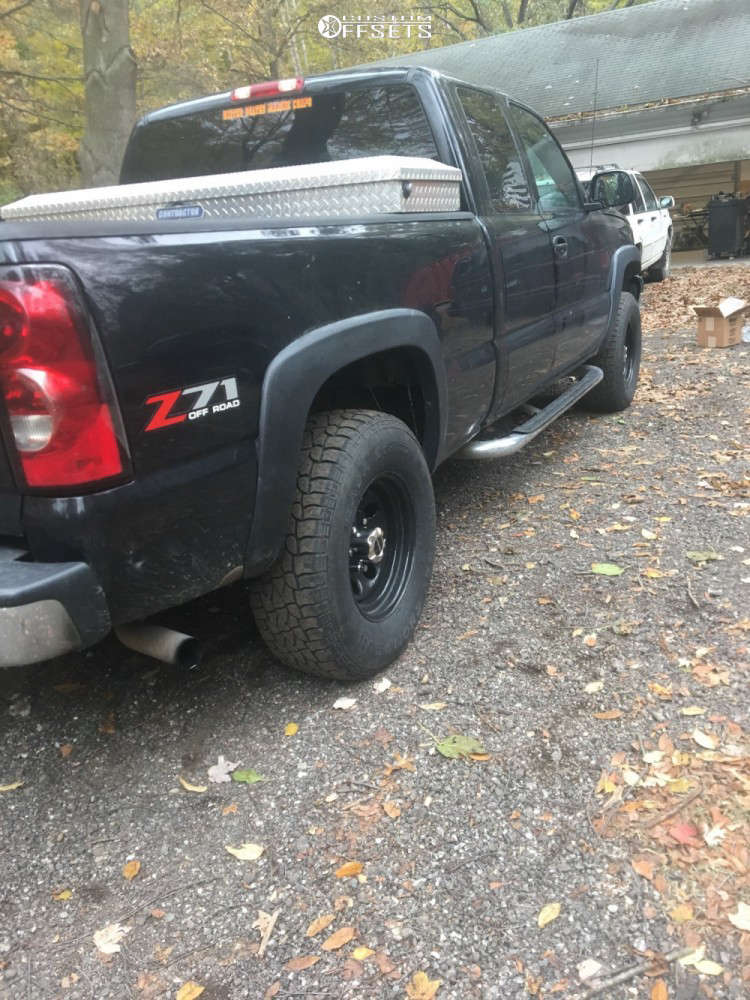 2004 Chevrolet Silverado 1500 with 16x8 -12 Vision Soft 8 and 265/75R16 ...