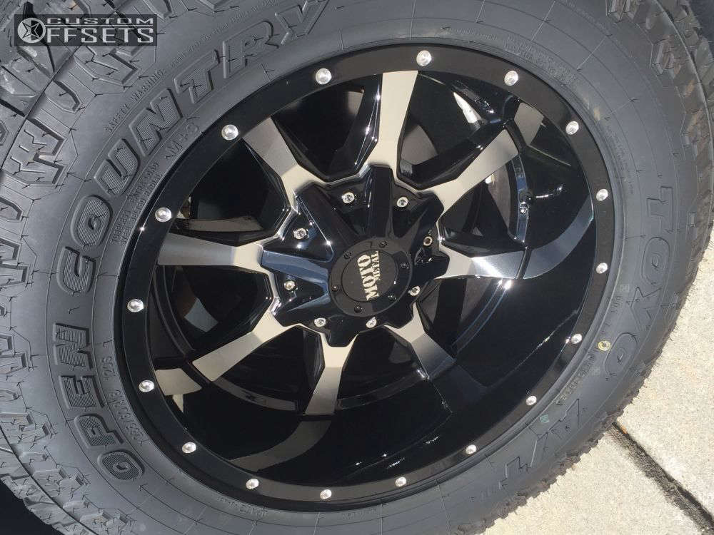 2001 Dodge Ram 1500 with 18x10 -24 Moto Metal MO970 and 285/60R18 Toyo ...