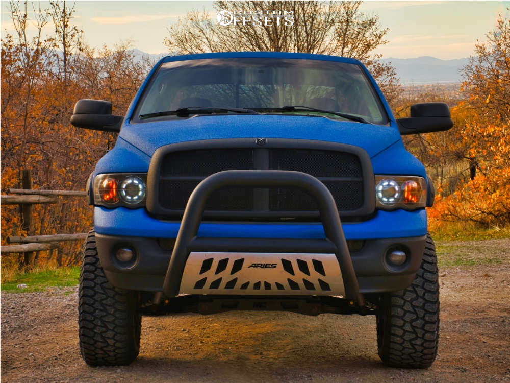 2003 Dodge Ram 1500 with 18x10 -24 Tuff T15 and 305/70R18 AMP Terrain ...