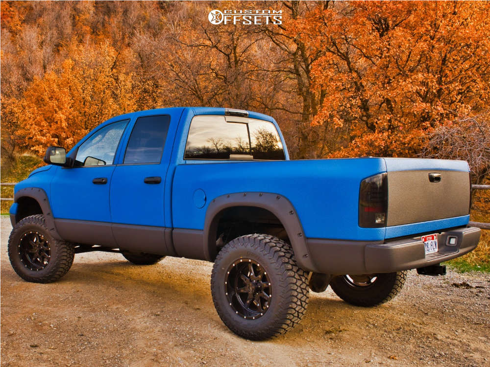 2003 Dodge Ram 1500 with 18x10 -24 Tuff T15 and 305/70R18 AMP Terrain ...