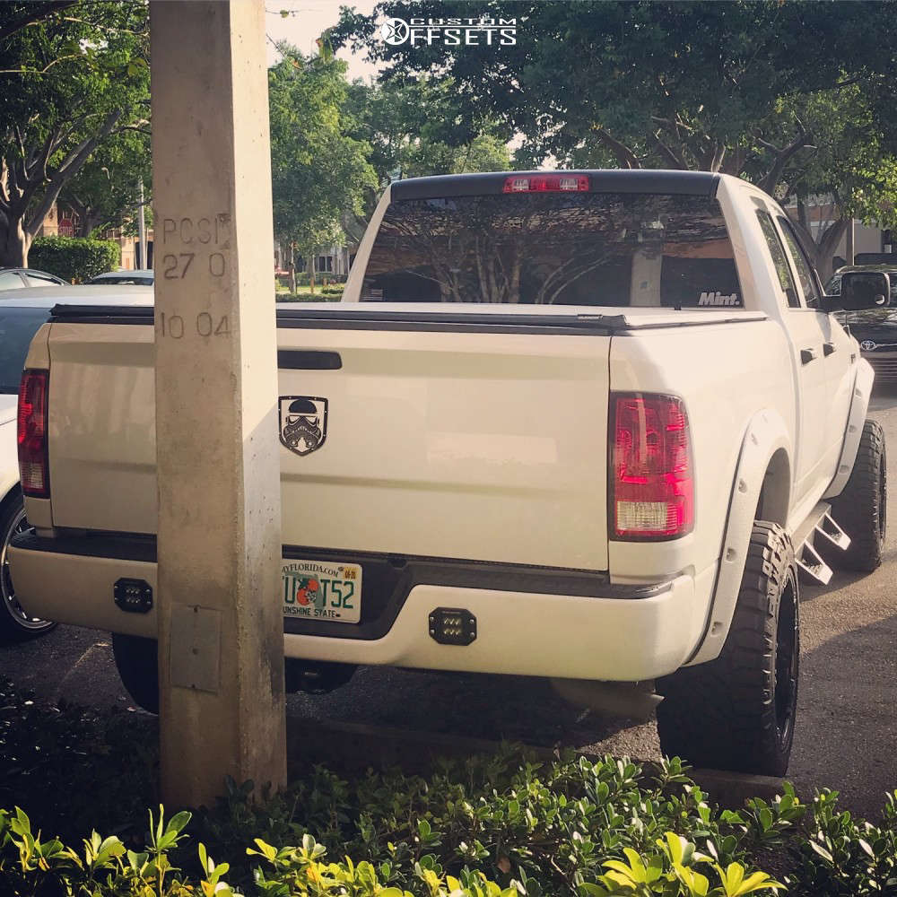 2017 Ram 1500 with 20x12 -44 Tuff T10 and 33/12.5R20 Nitto Ridge ...