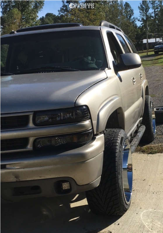 2003 Chevrolet Tahoe with 22x12 -51 Vision Rocker and 305/45R22 Toyo ...