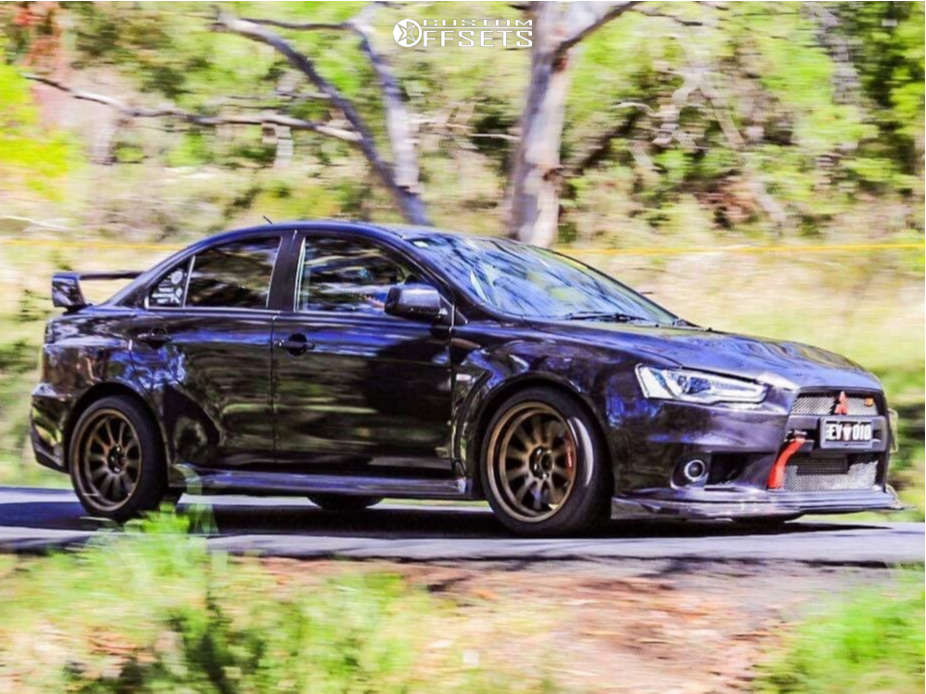 2013 Mitsubishi Lancer with 18x10.5 15 Volk Ce28n and 265/35R18 Falken ...
