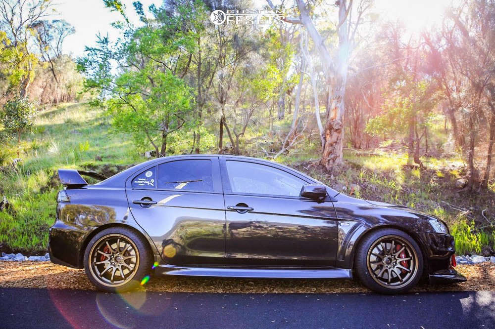 2013 Mitsubishi Lancer with 18x10.5 15 Volk Ce28n and 265/35R18 Falken ...