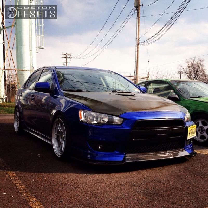 2008 Mitsubishi Lancer with 18x9.5 38 Enkei RPF1 and 225/40R18 Falken ...