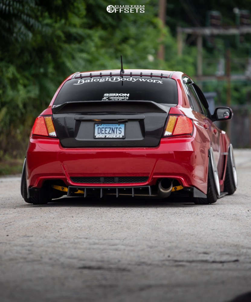 2011 Subaru WRX STI with 18x10.5 6 Brada Ts-10 and 215/40R18 Nitto Neo ...