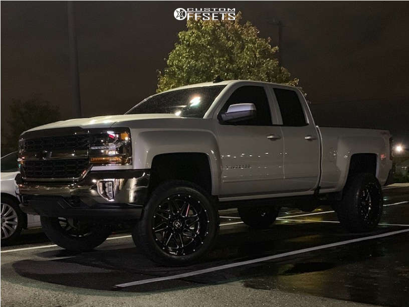 2016 Chevrolet Silverado 1500 with 22x12 -44 Hostile Sprocket and 35/12.5R22 Nitto Recon ...