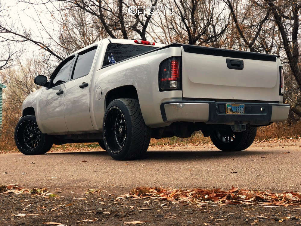 2010 Chevrolet Silverado 1500 with 22x12 -44 TIS 544BM and 305/40R22 ...