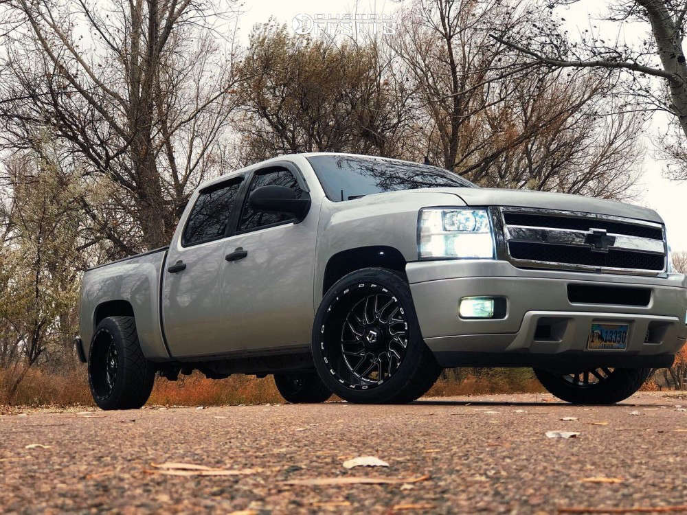 2010 Chevrolet Silverado 1500 with 22x12 -44 TIS 544BM and 305/40R22 ...
