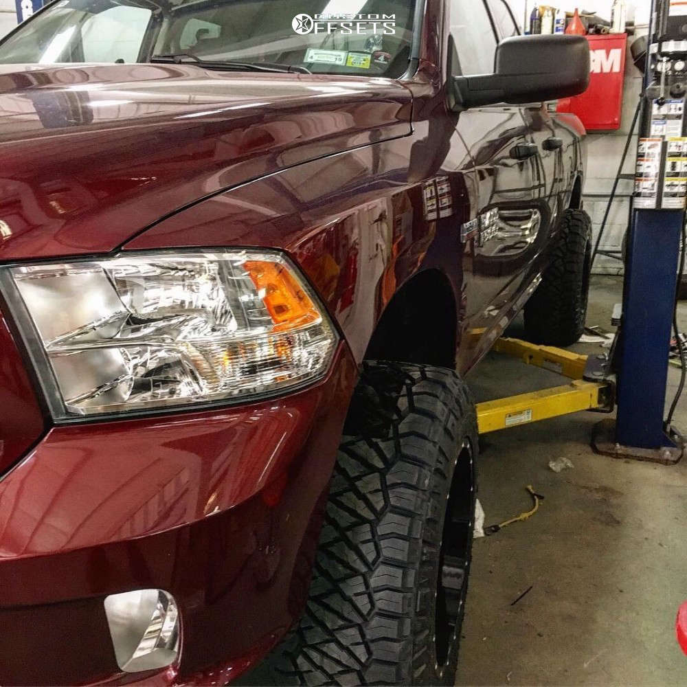 2017 Ram 1500 with 20x12 -44 TIS 535MB and 35/12.5R20 Nitto Ridge ...