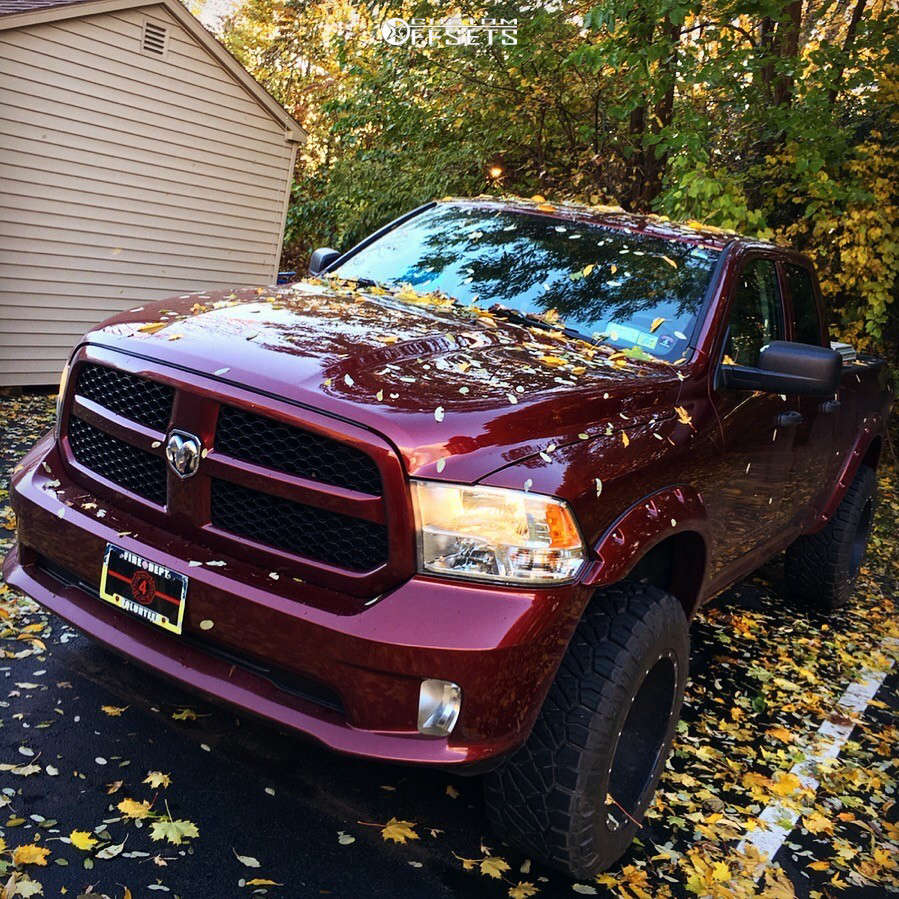 2017 Ram 1500 with 20x12 -44 TIS 535MB and 35/12.5R20 Nitto Ridge ...