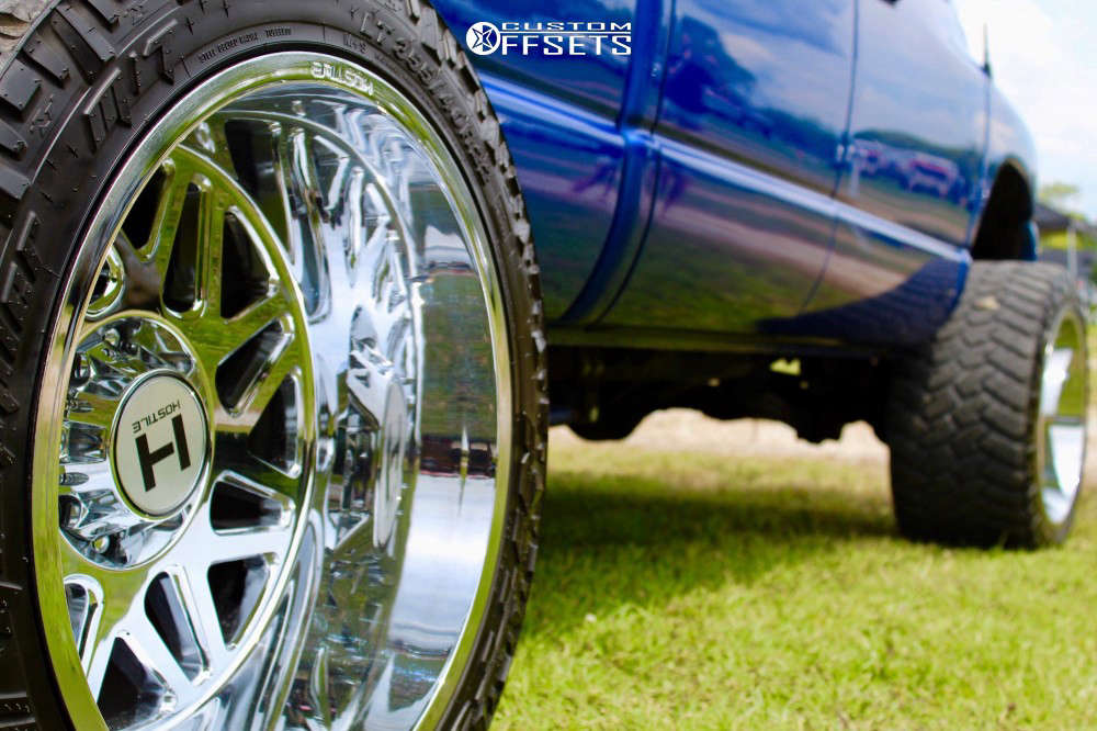 2008 Dodge Ram 2500 with 22x14 -76 Hostile Sprocket and 355/40R22 Nitto ...