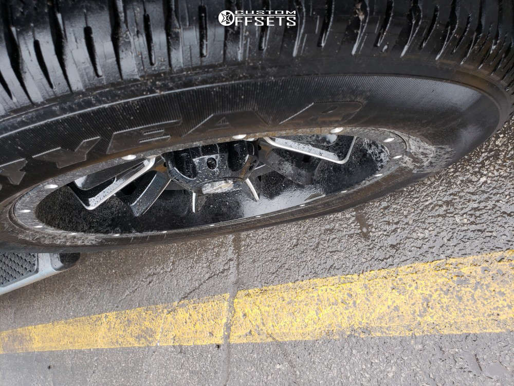 2018 Ram 1500 with 20x9 -12 Vision Bomb and 275/60R20 Goodyear Wrangler ...