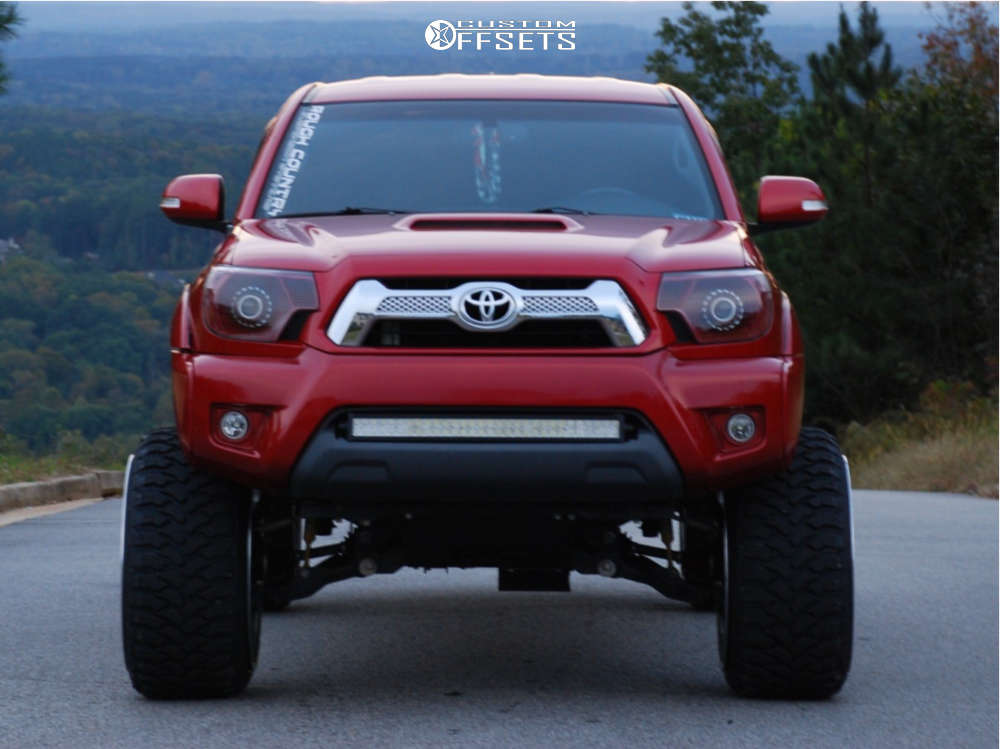 2012 Toyota Tacoma with 24x14 -73 American Force Atom Ss and 33/12.5R24 ...