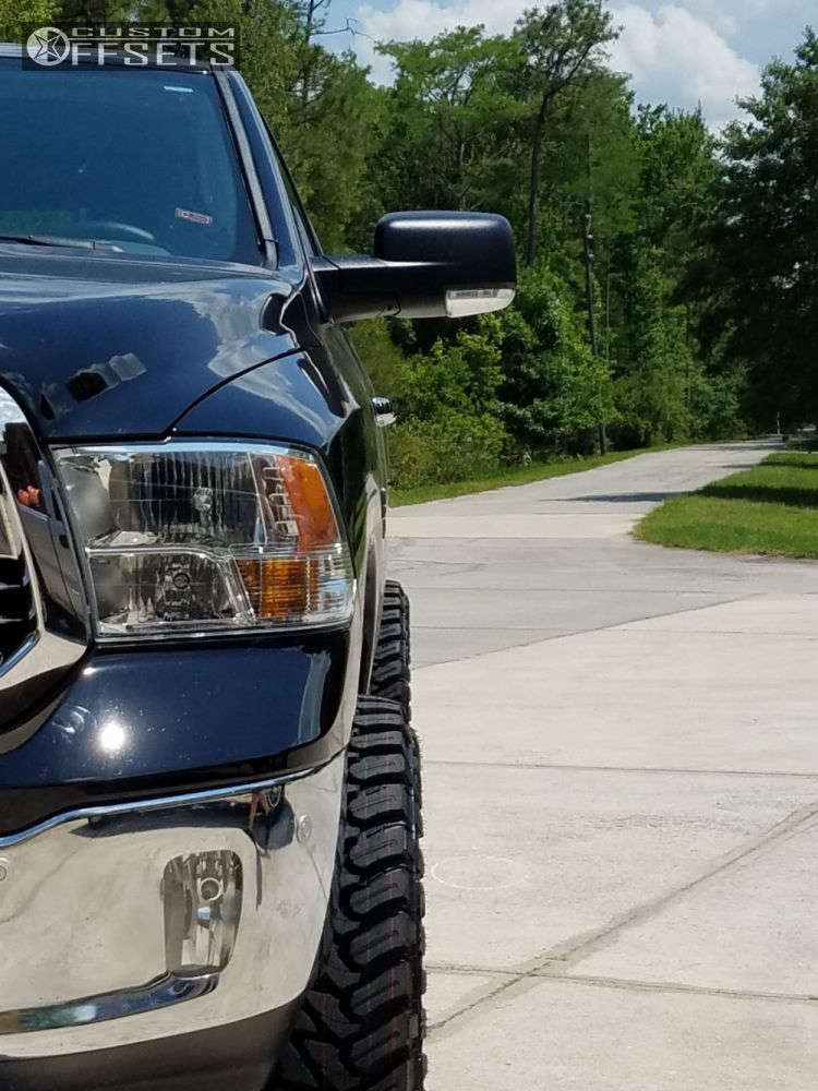 2015 Ram 1500 with 22x10 -24 Fuel Maverick D536 and 35/12.5R22 Atturo ...