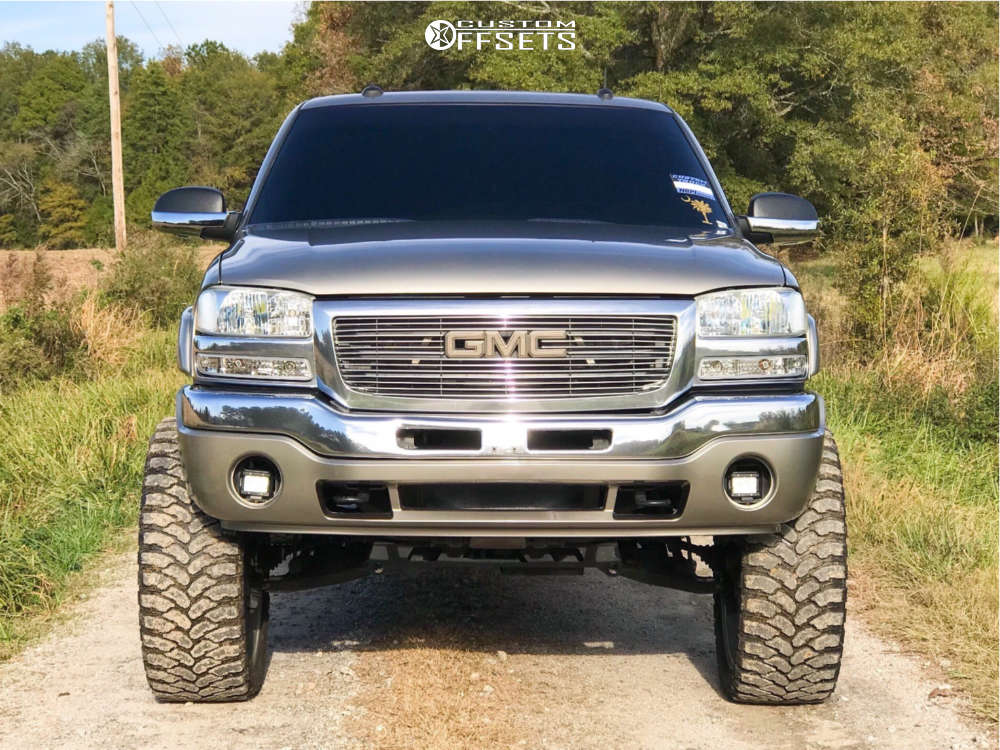 2003 GMC Sierra 1500 with 26x10 31 Replica A04 and 37/13.5R26 Comforser ...