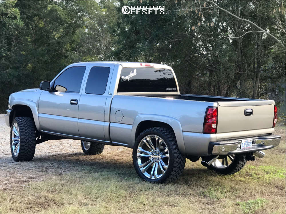2003 GMC Sierra 1500 with 26x10 31 Replica A04 and 37/13.5R26 Comforser ...